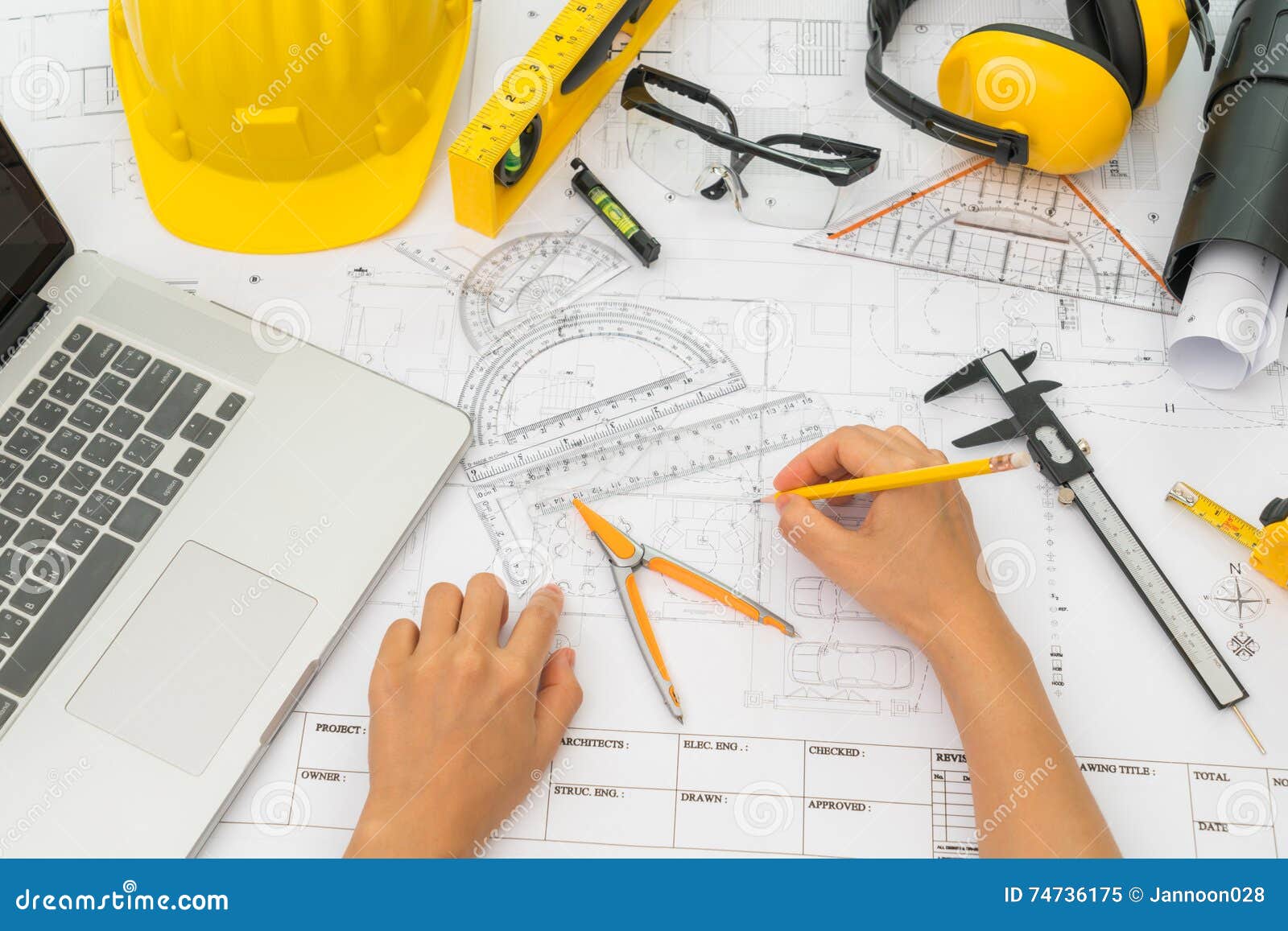 Hand Over Construction Plans with Yellow Helmet and Drawing Tool Stock ...