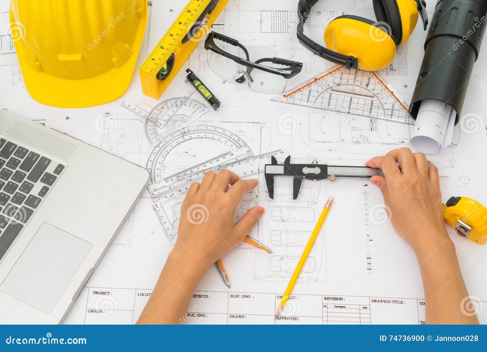 Hand Over Construction Plans with Yellow Helmet and Drawing Tool Stock ...