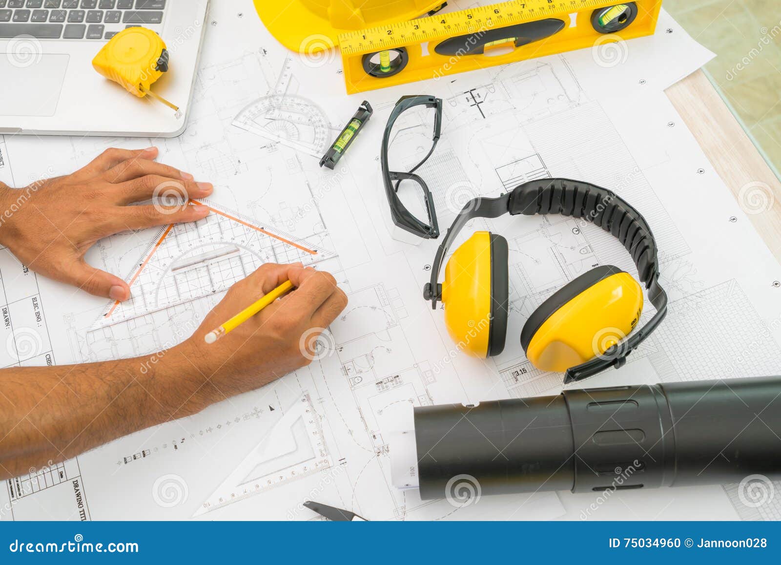 Hand Over Construction Plans with Yellow Helmet and Drawing Tool Stock ...