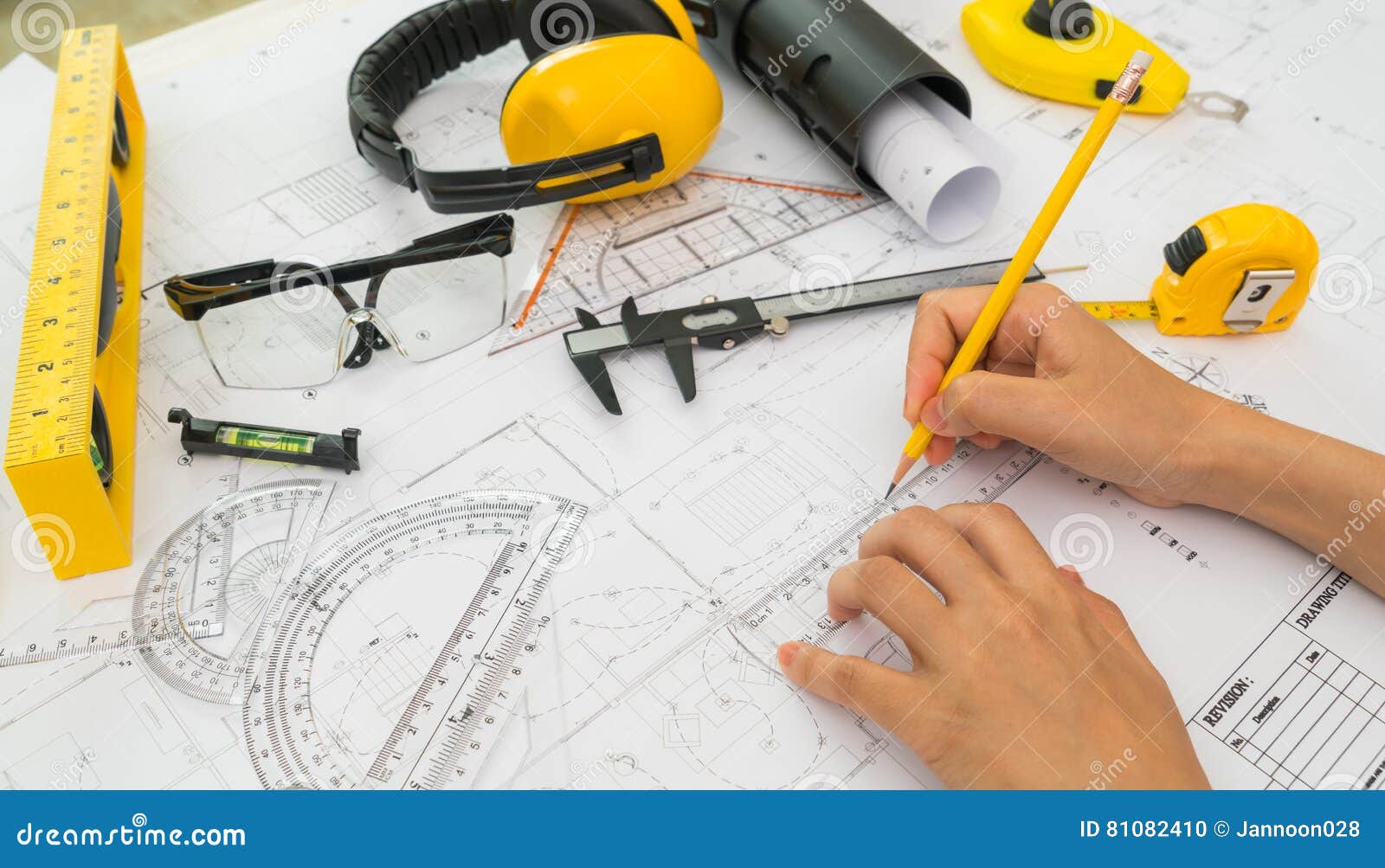 Hand Over Construction Plans with Yellow Helmet and Drawing Tool Stock ...
