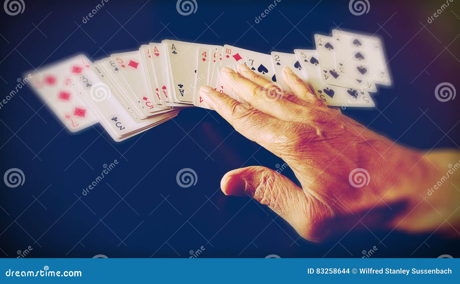 Hand over playing cards stock photo. Image of spreading - 83258644