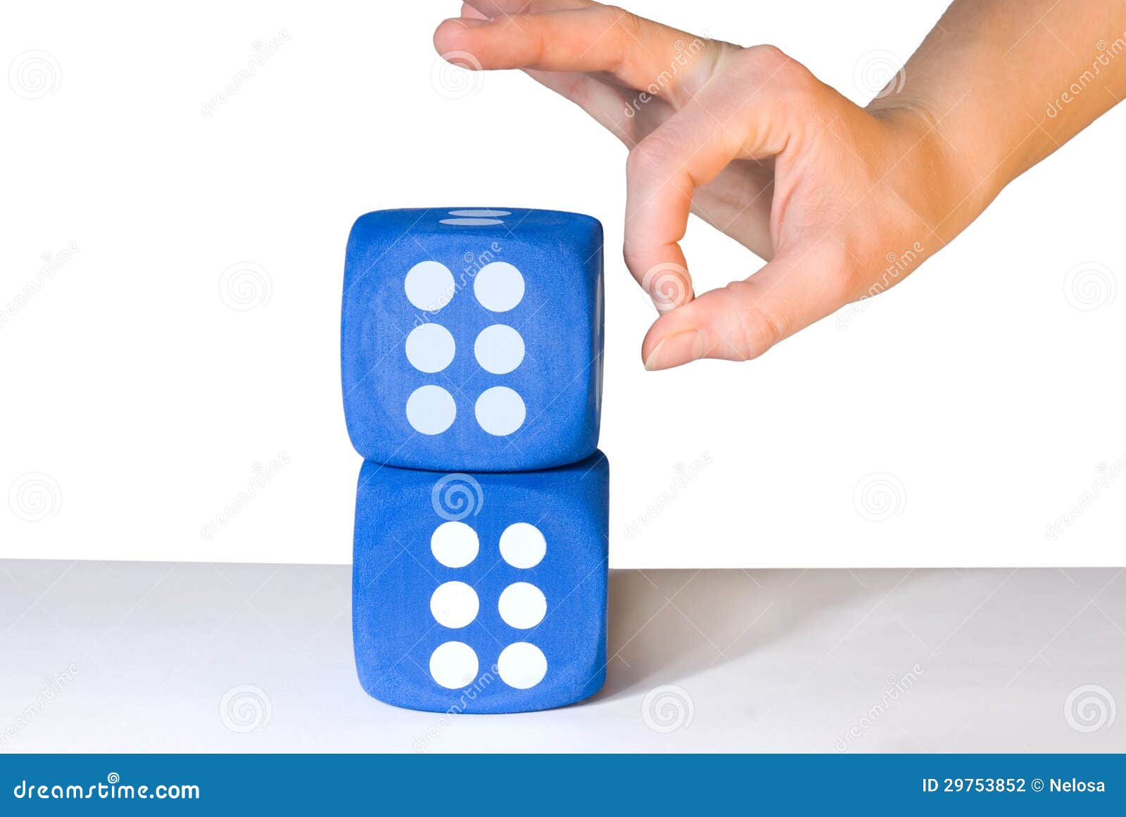 Hand overbalancing dice stock photo. Image of overbalancing - 29753852