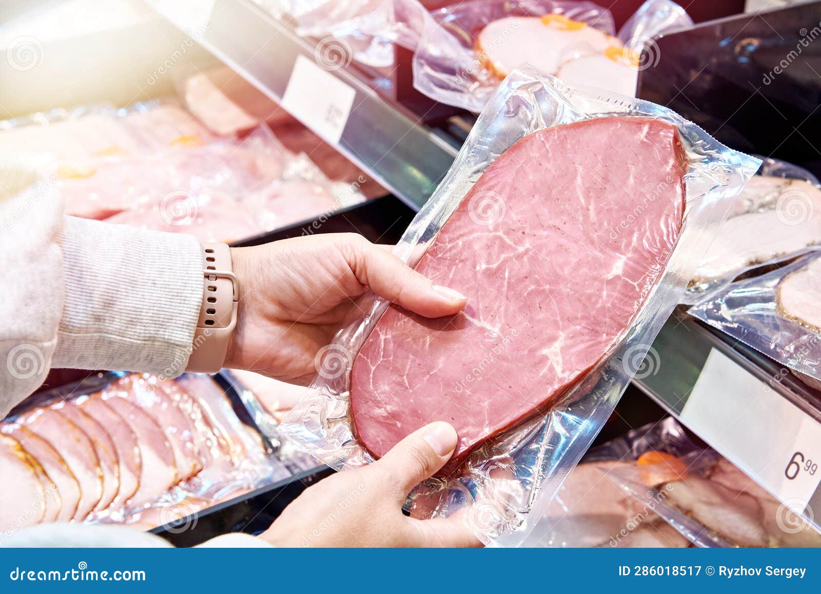 Hand with beef meat stock image. Image of store, display - 286018517