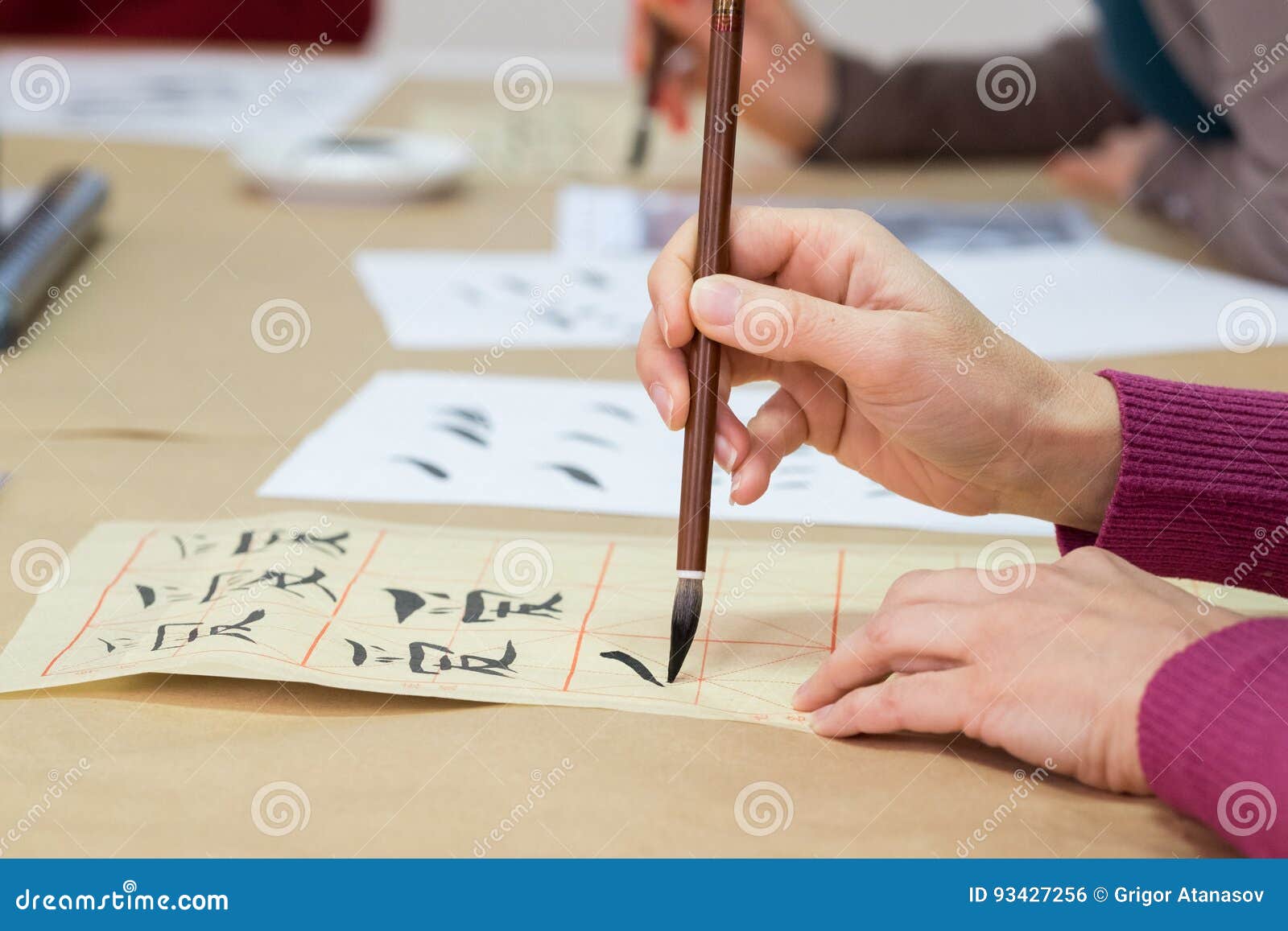 Hand with Paint Brush Calligraphy Stock Photo - Image of paper, craft ...