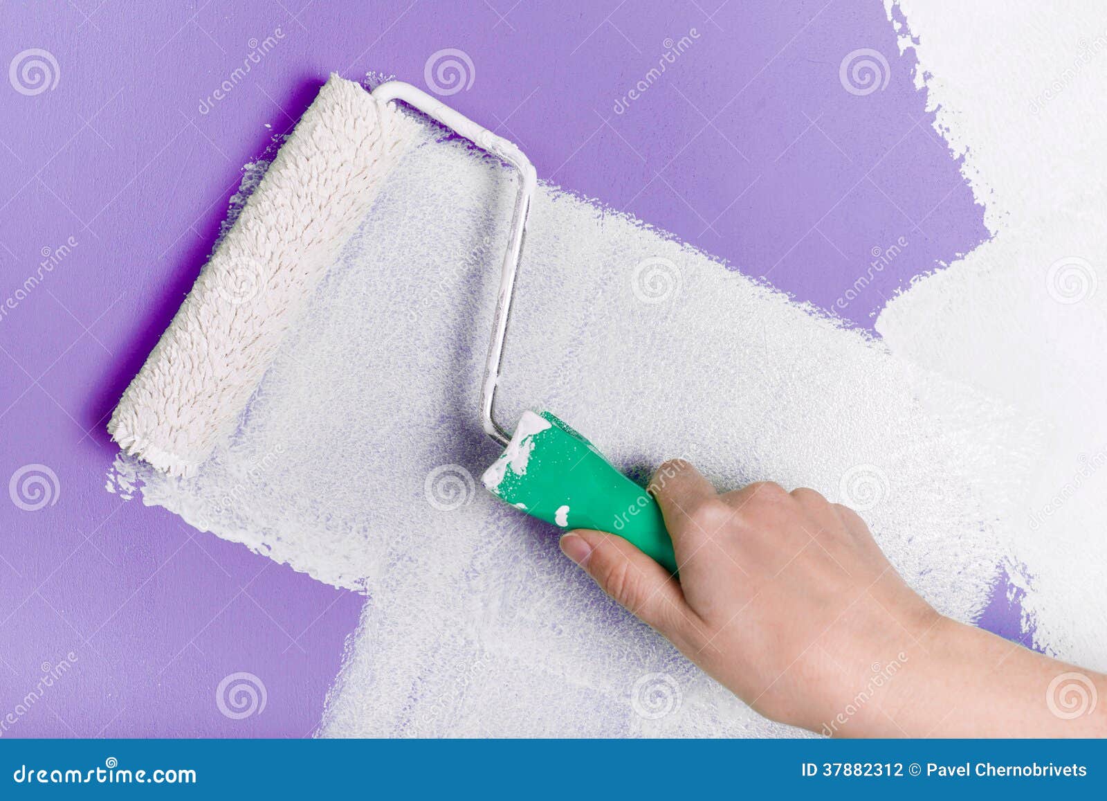 Hand with paint roller stock photo. Image of interior - 37882312