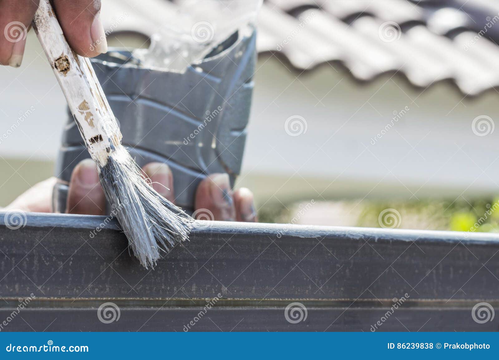 Hand with Paintbrush Painting. Stock Photo - Image of construction ...