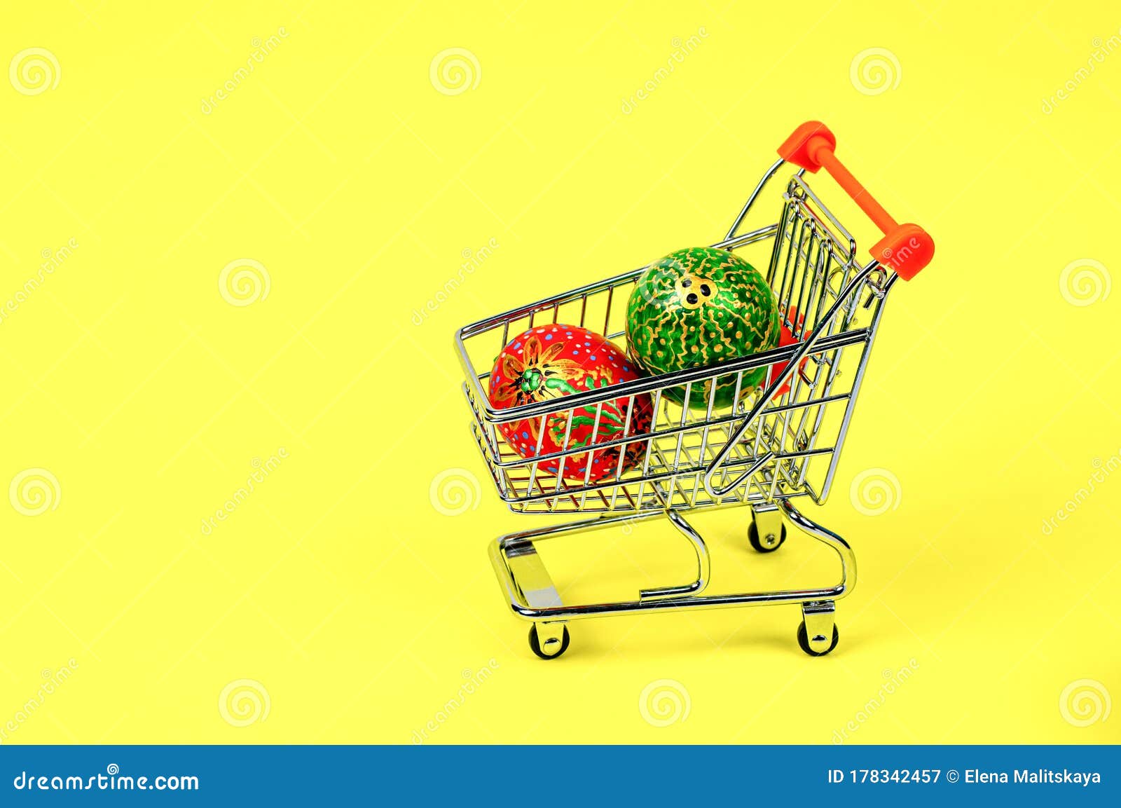 Hand-painted Easter Eggs in a Supermarket Trolley on Yellow Stock Image ...