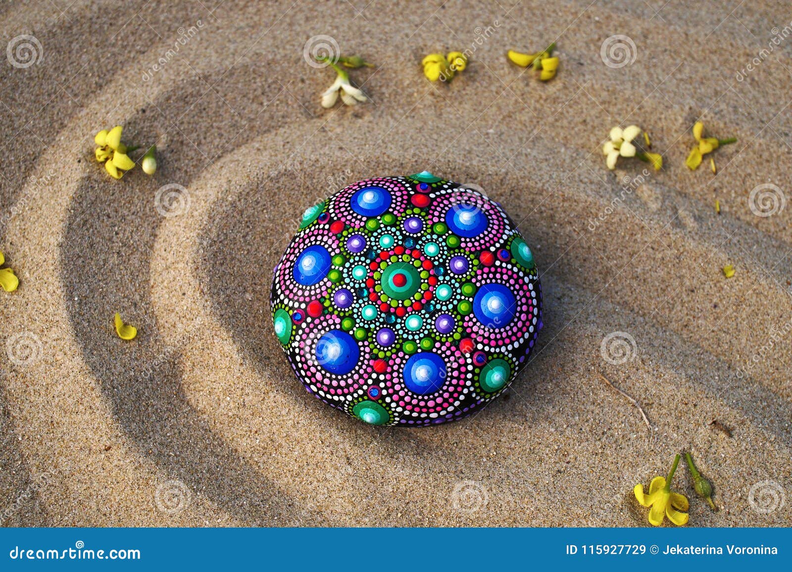 Hand Painted Mandala Rock on Sand Stock Image - Image of color, paints ...