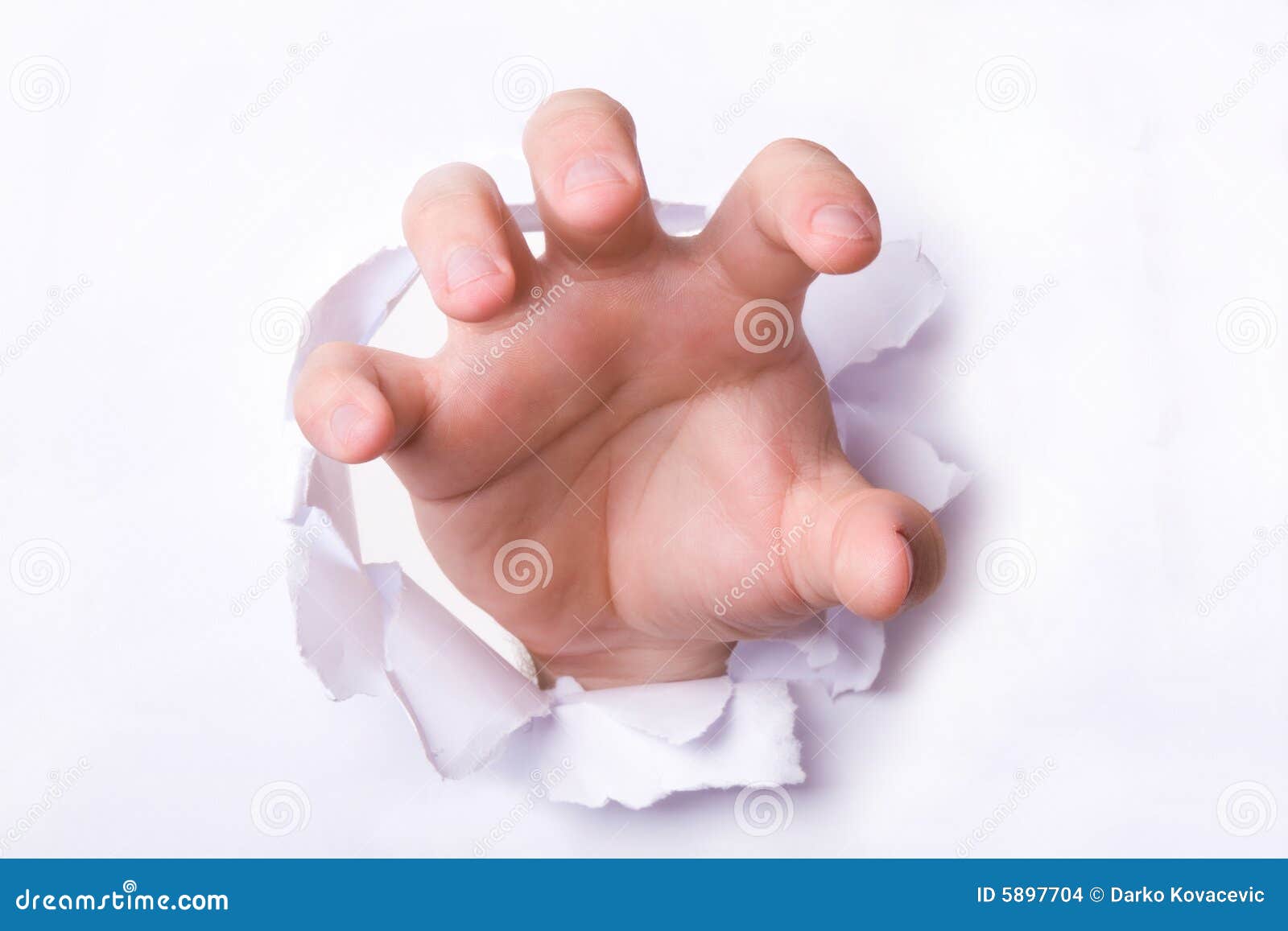 Hand through paper stock photo. Image of menacing, grabbing - 5897704
