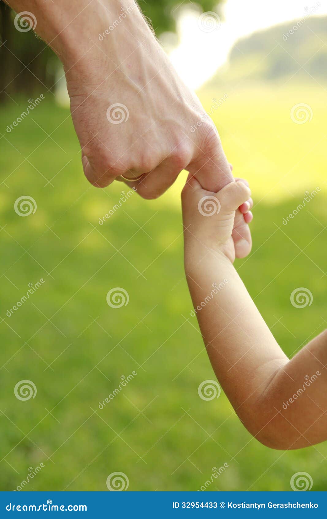 Hand of Parent and Child in Nature Stock Image - Image of friendship ...