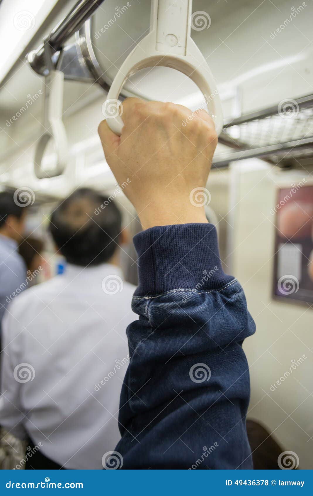 Hand of Passengers Hold on Rail Handle of Transit System Stock Photo ...