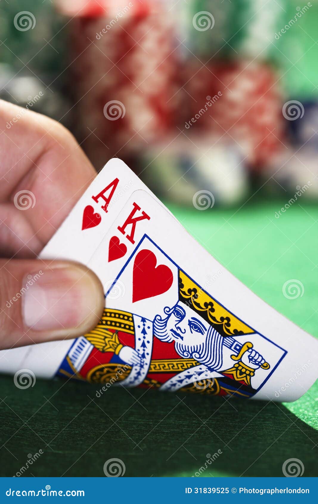 Hand Peeked at Two Cards stock image. Image of finger - 31839525