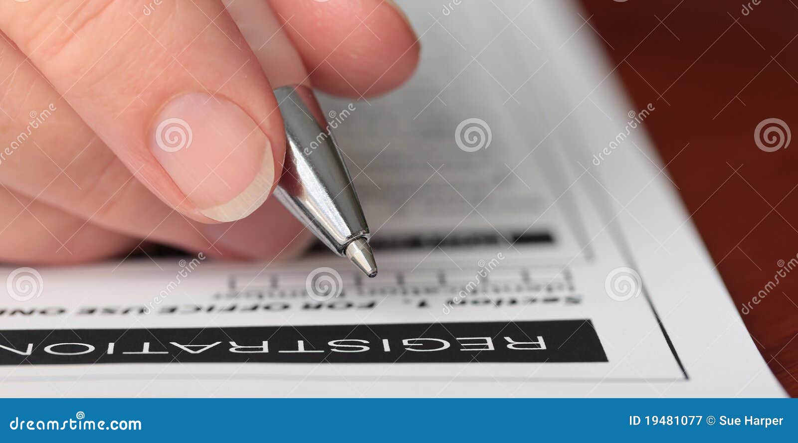 Hand with Pen Filling Out a Form Closeup Stock Image - Image of desk ...