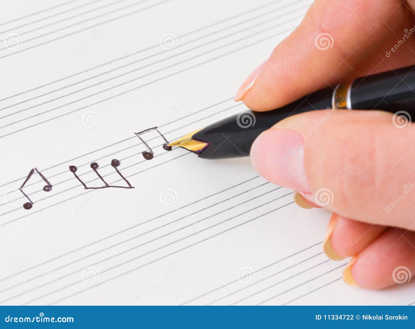 Hand with Pen and Music Sheet Stock Photo - Image of creation ...