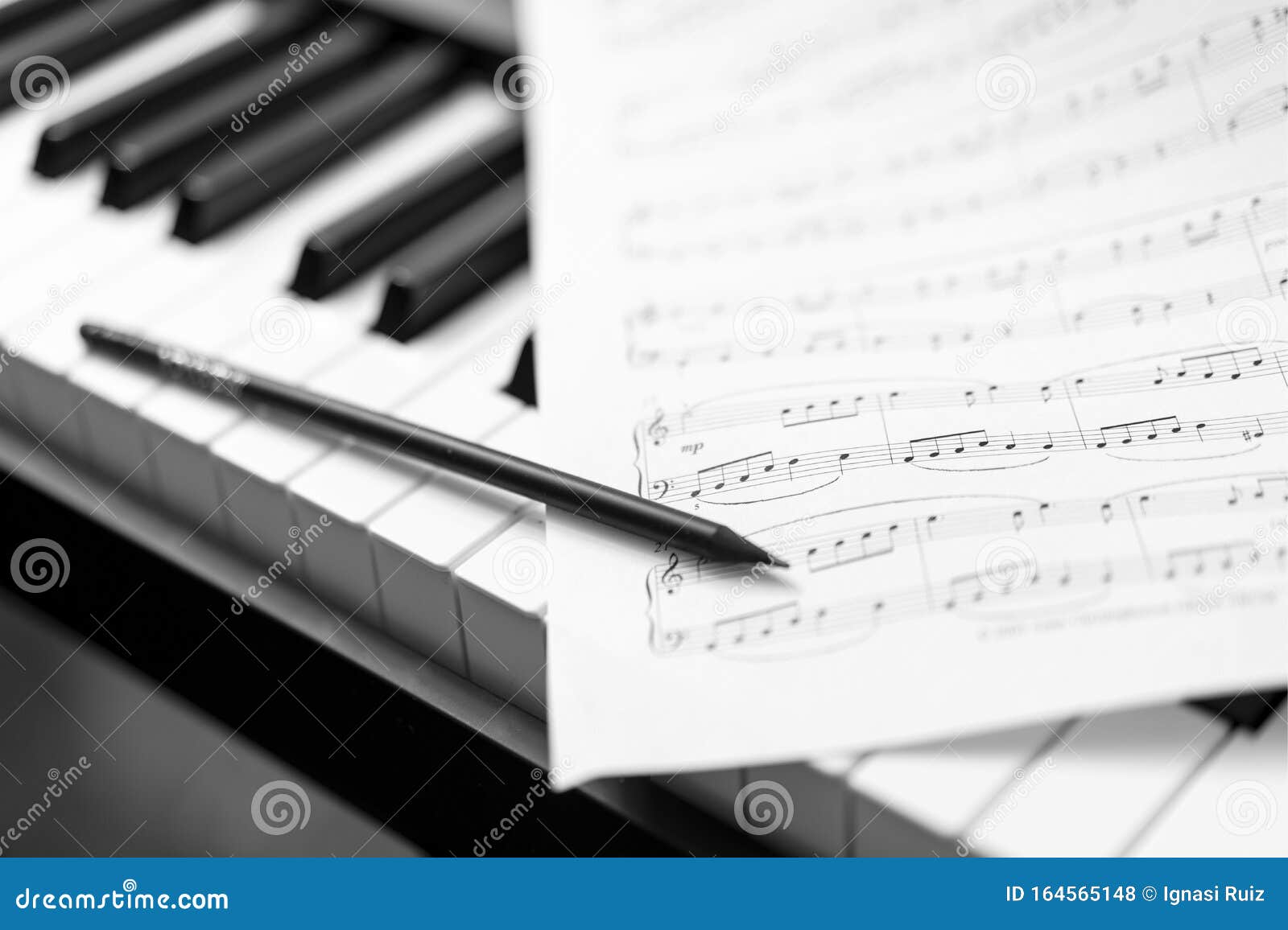 Hand with Pen and Music Sheet - Musical Background Stock Photo - Image ...
