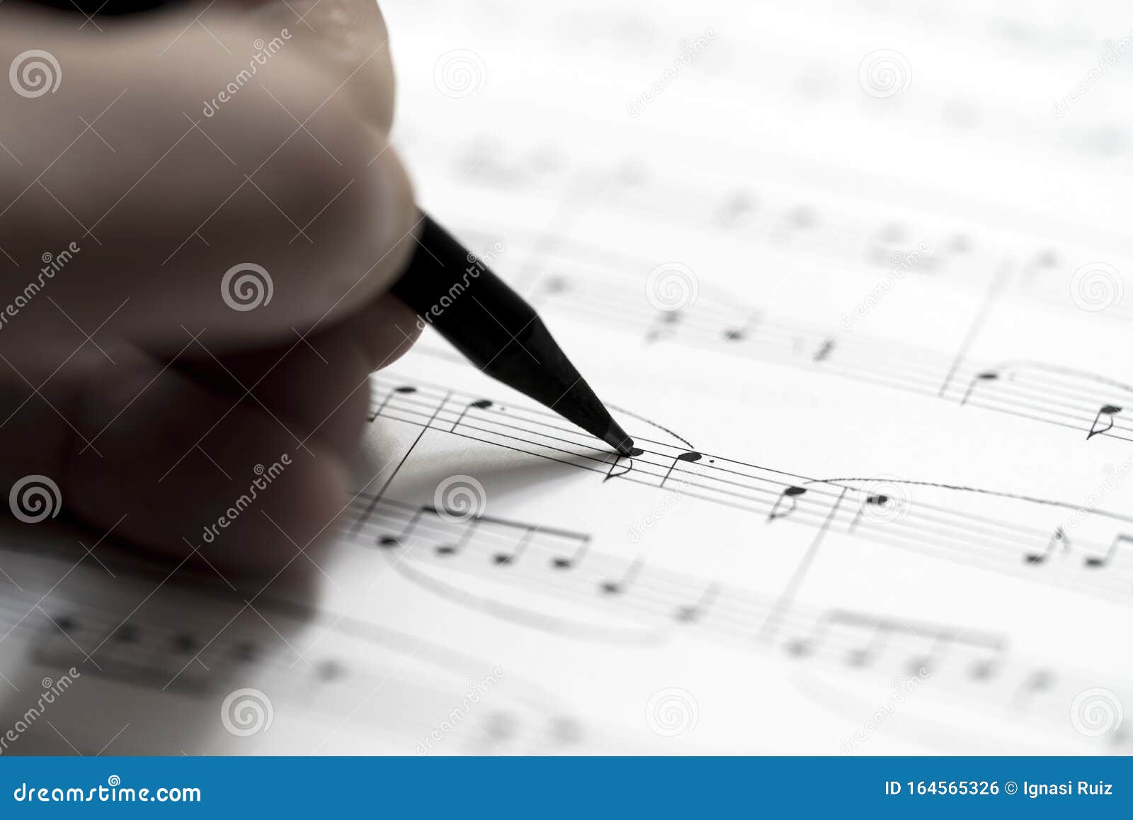 Hand with Pen and Music Sheet - Musical Background Stock Photo - Image ...
