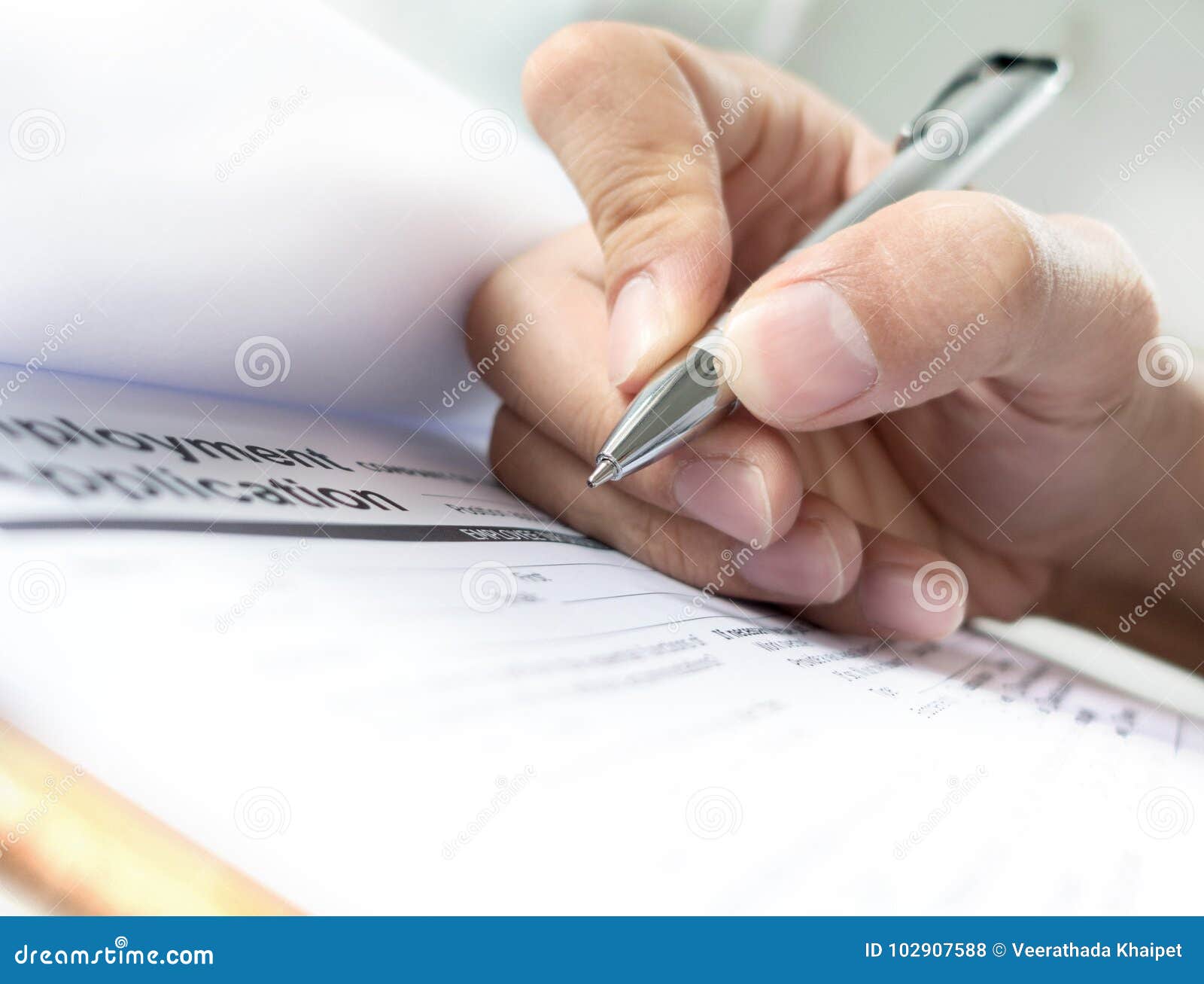 Hand with Pen Over Application Form Stock Photo - Image of business ...