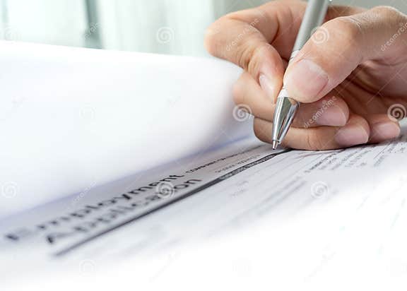 Hand with Pen Over Application Form Stock Image - Image of form, answer ...