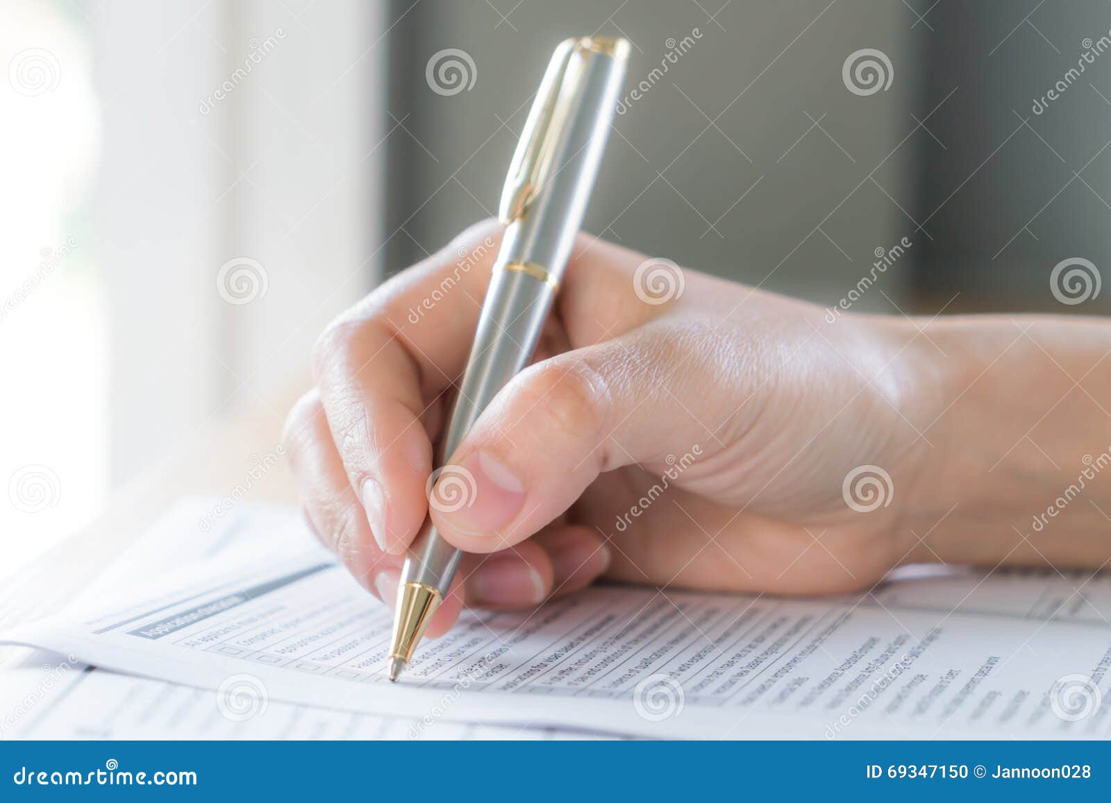 .Hand with Pen Over Application Form Stock Photo - Image of test ...