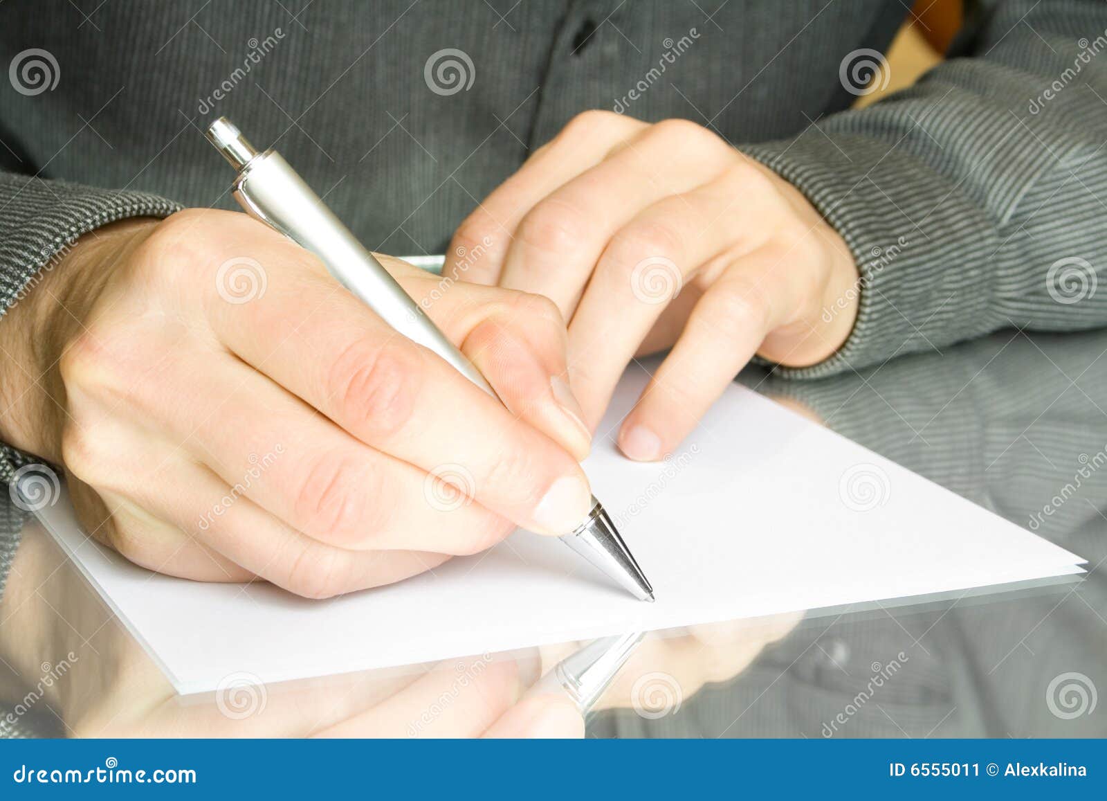 Hand with pen and paper stock image. Image of human, hand - 6555011