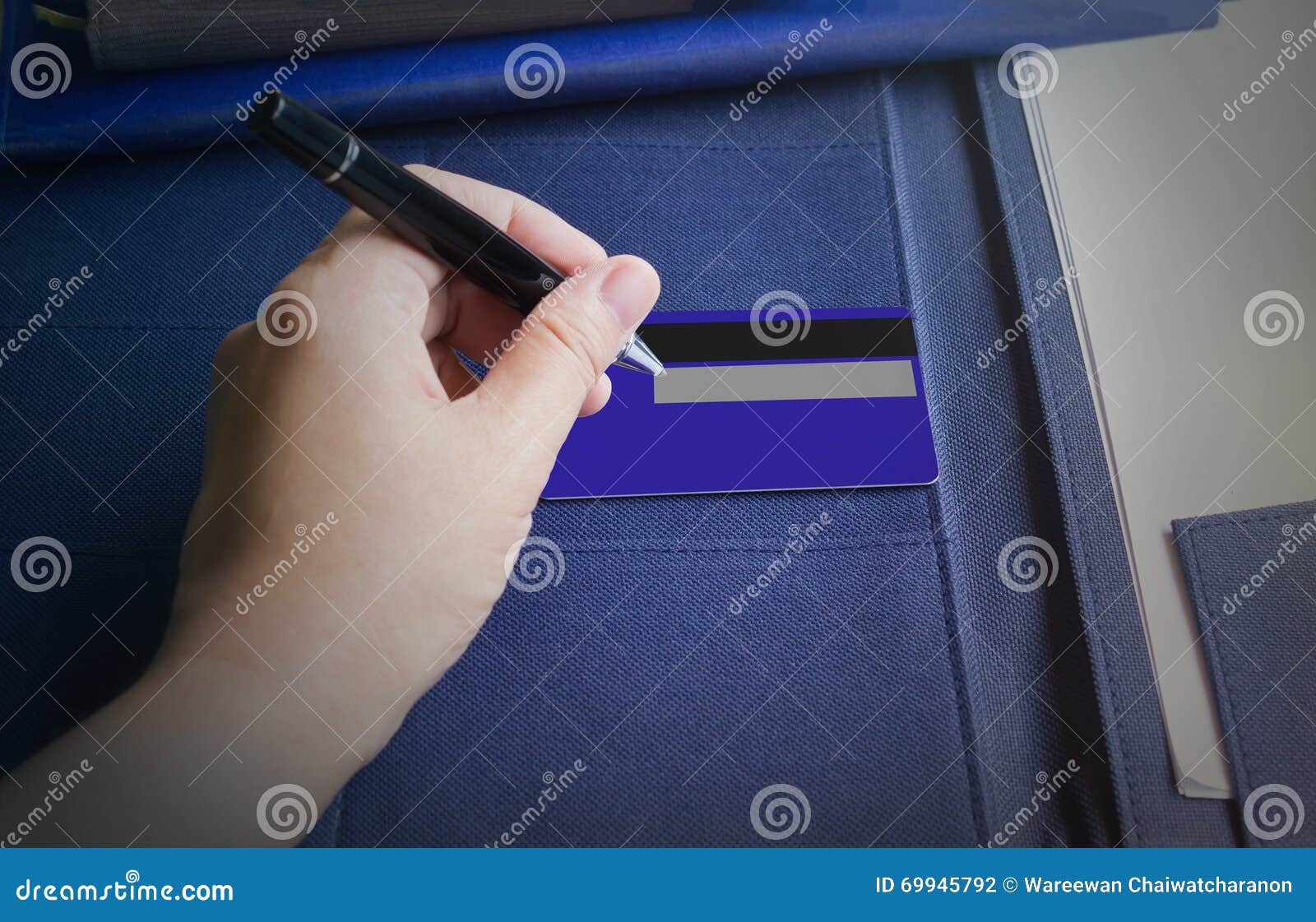 Hand with Pen Sign or Writing Down at the Back of Credit Card Stock ...