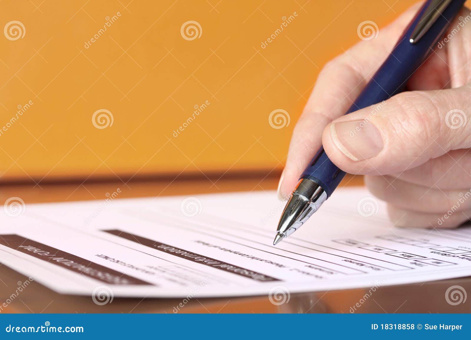 Hand with Pen Signing Form on Orange Background Stock Photo - Image of ...