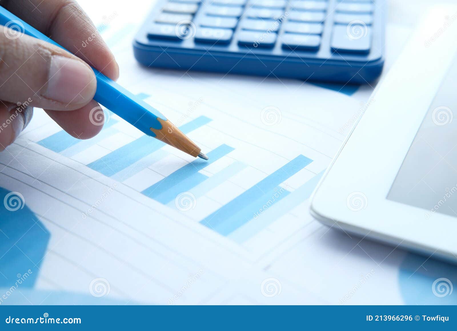 Hand with Pencil Analyzing Bar Chart on Paper Stock Photo - Image of ...