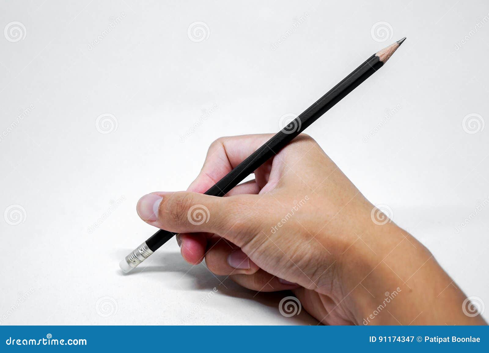 Hand with a pencil erasing stock image. Image of classroom - 91174347