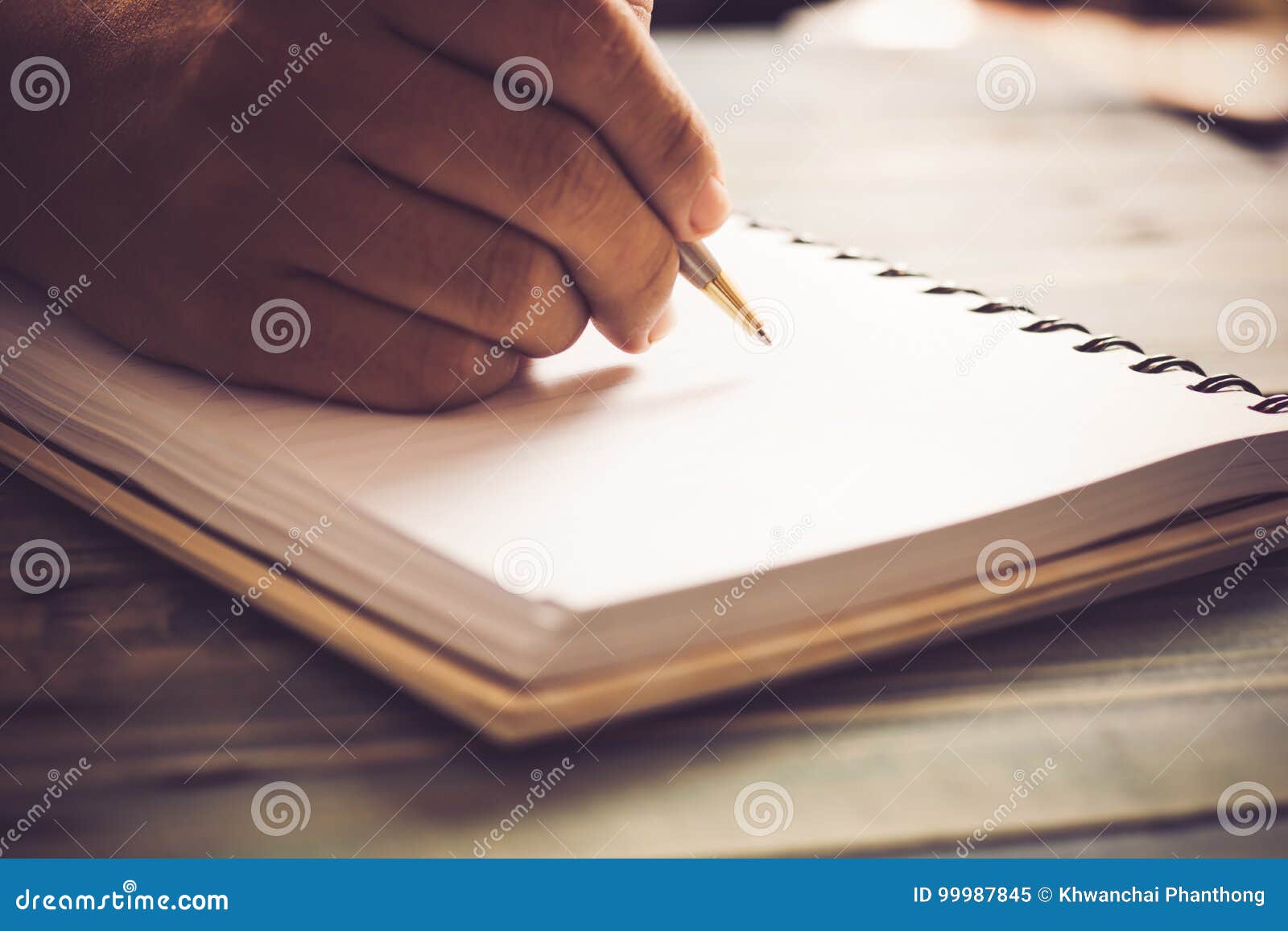 Hand of People, Student Writing and Note on Notebook on Wood Table with ...