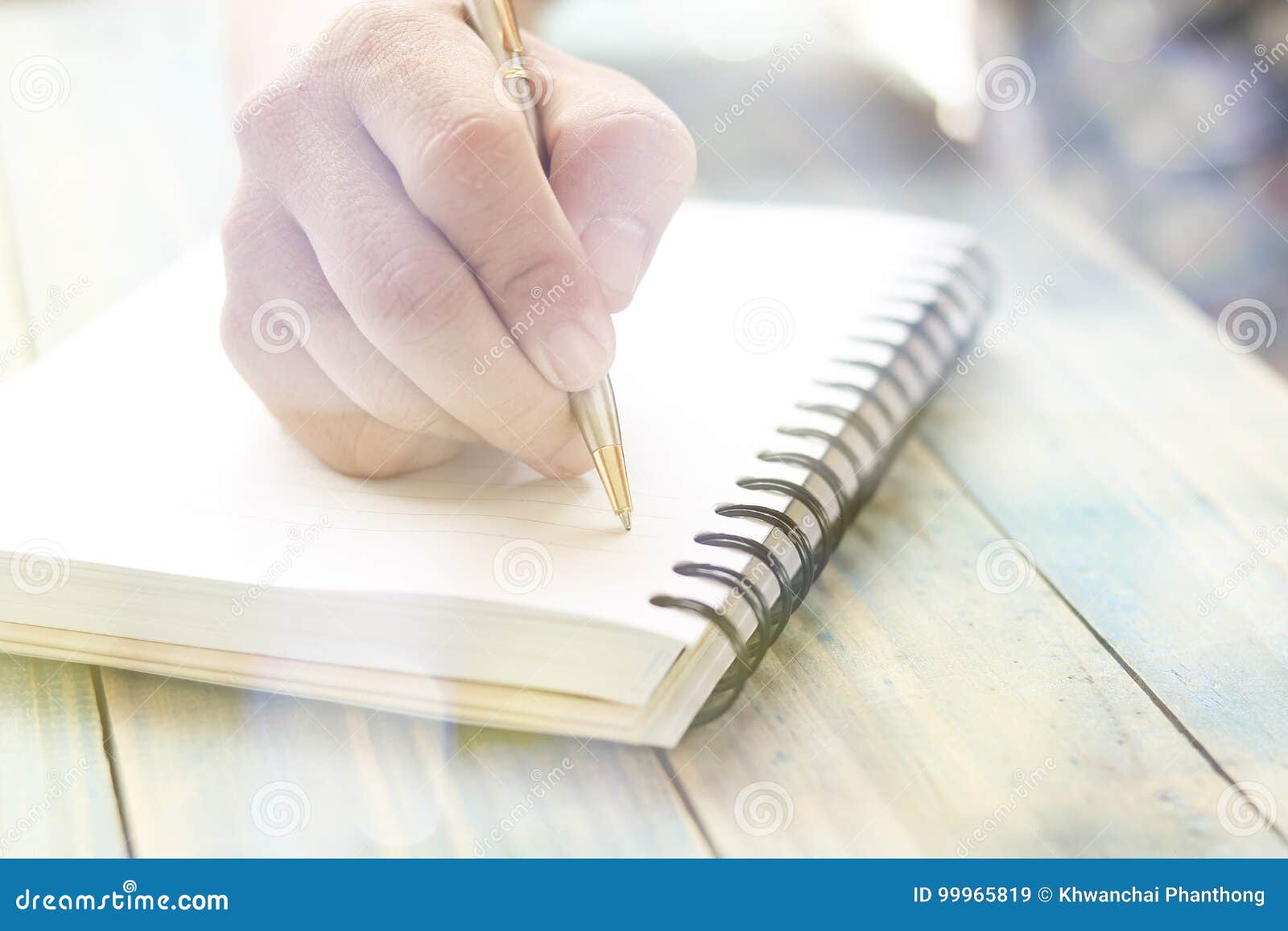 Hand of People, Student Writing and Note on Notebook on Wood Table with ...