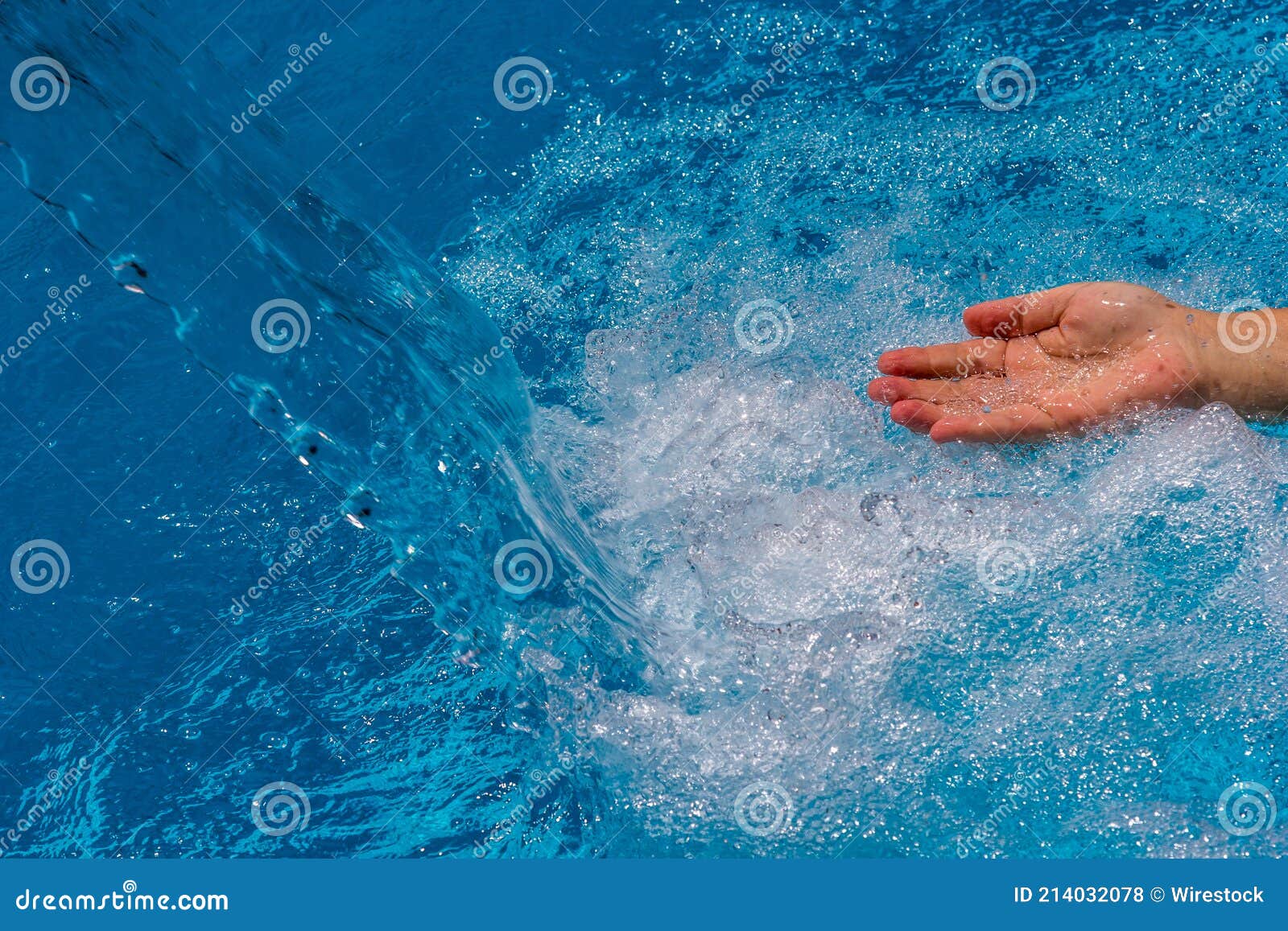 Hand of a Person in the Crystal Blue Water of a Pool Stock Photo ...