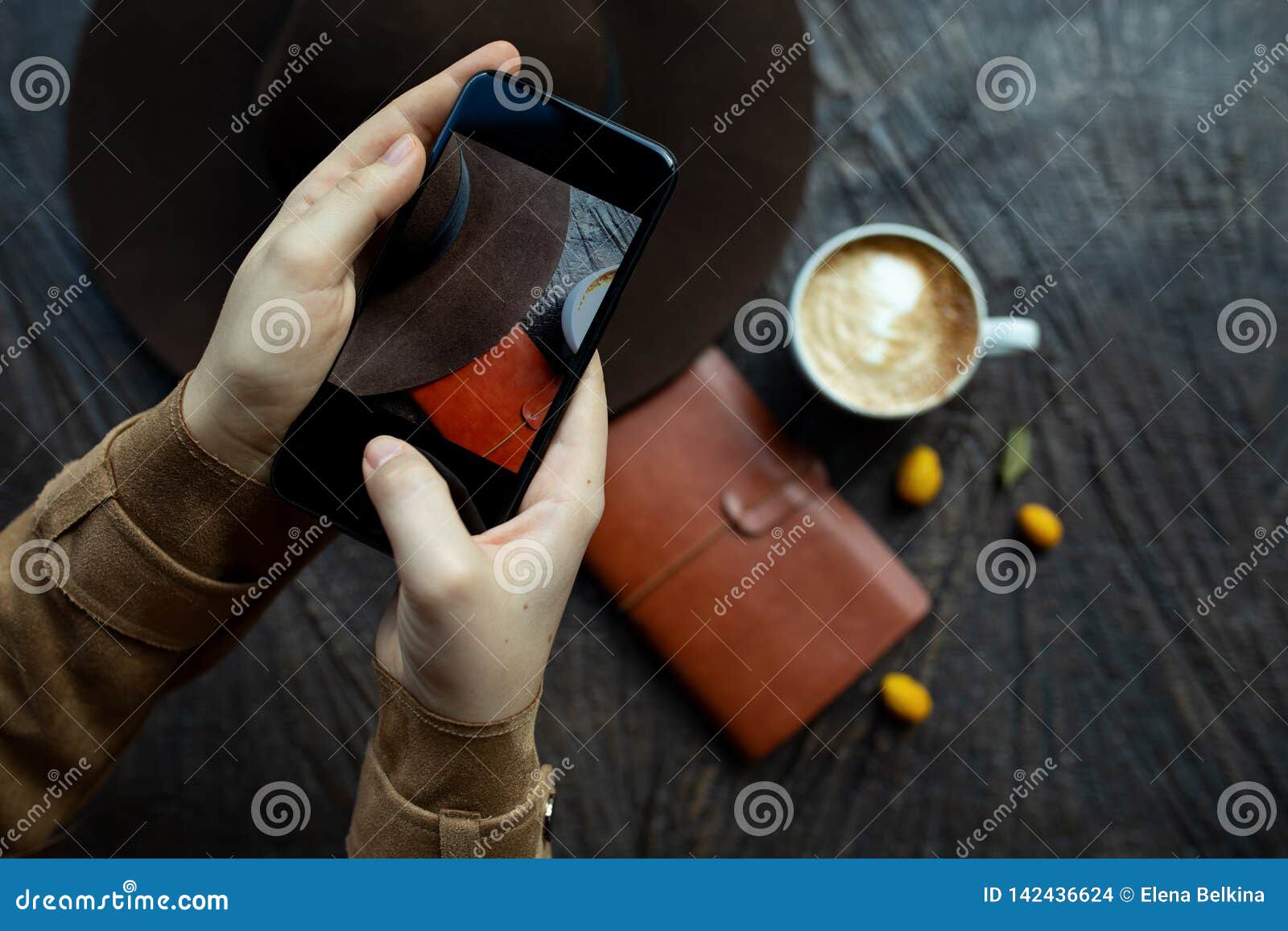Hand with phone in frame stock photo. Image of cell - 142436624