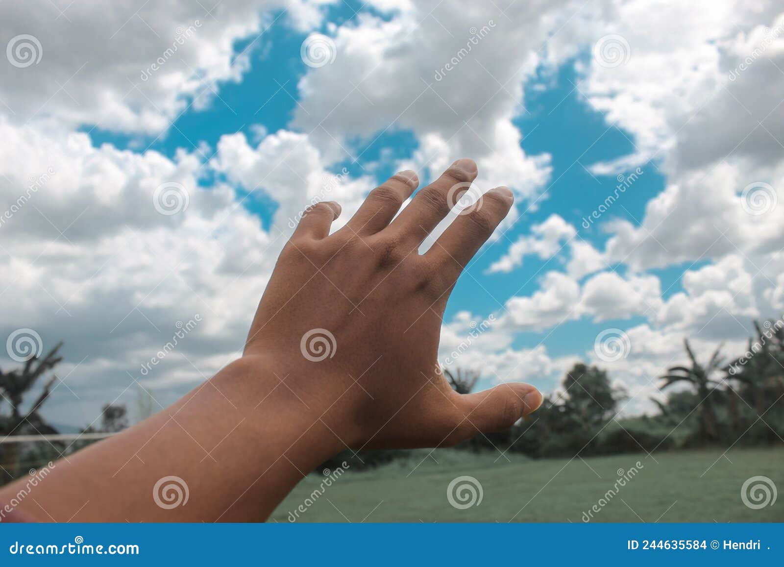 Hand Photo with Blue and White Sky Background Stock Photo - Image of ...