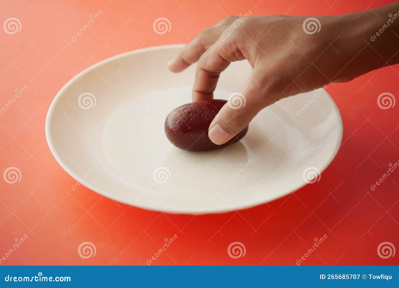 Hand pick a indian sweet stock image. Image of sugar - 265685707