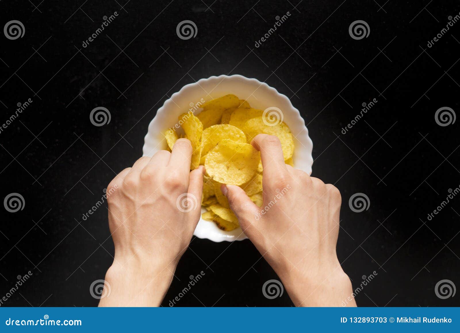Hand Pick Take the Fried Potato Chips from the Plate F Stock Image ...