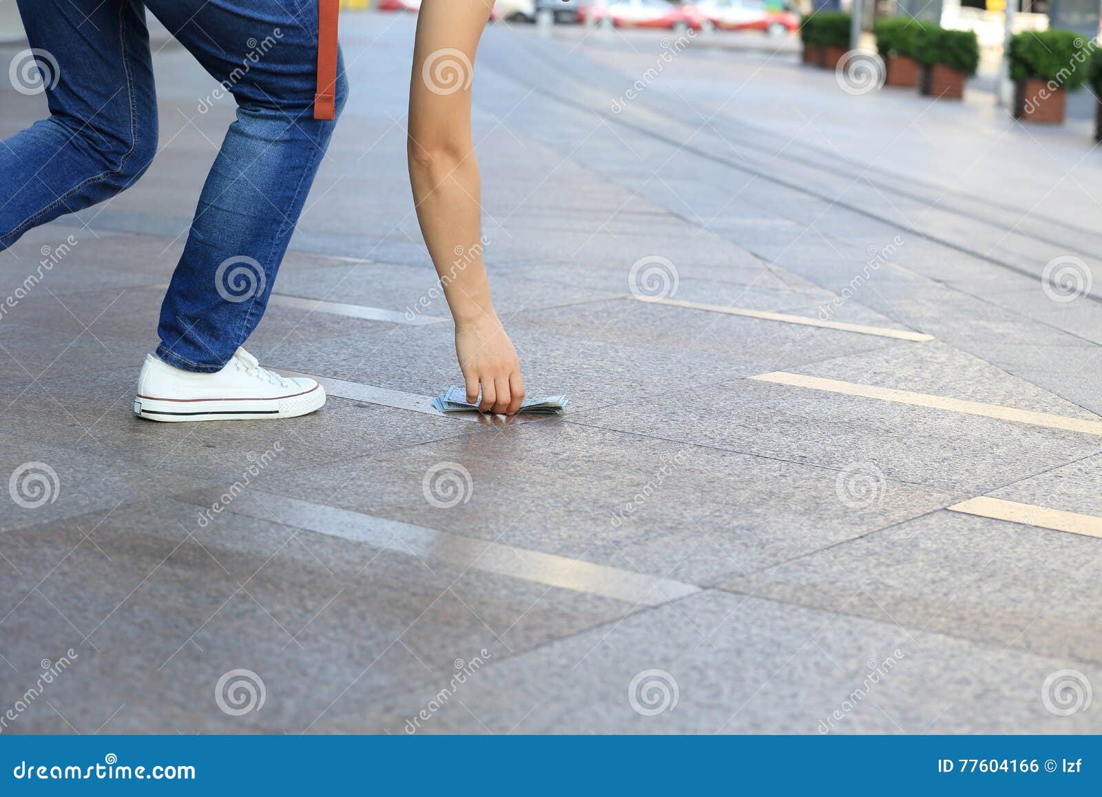 Hand pick up lost money stock photo. Image of dollars - 77604166