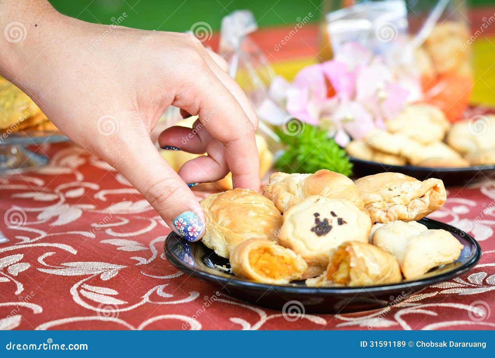Hand picking a cookie stock image. Image of detail, cookies - 31591189