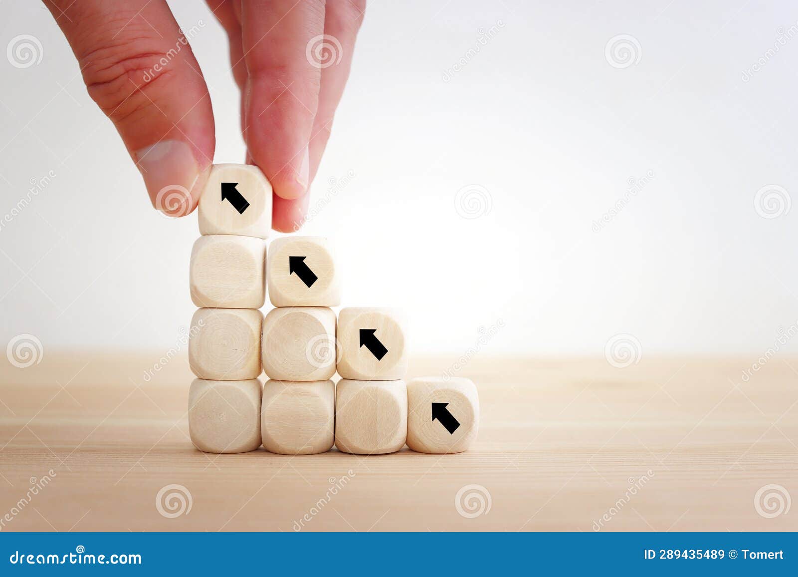 Hand Picking Cube with Red Arrow Facing Up Stock Image - Image of ...