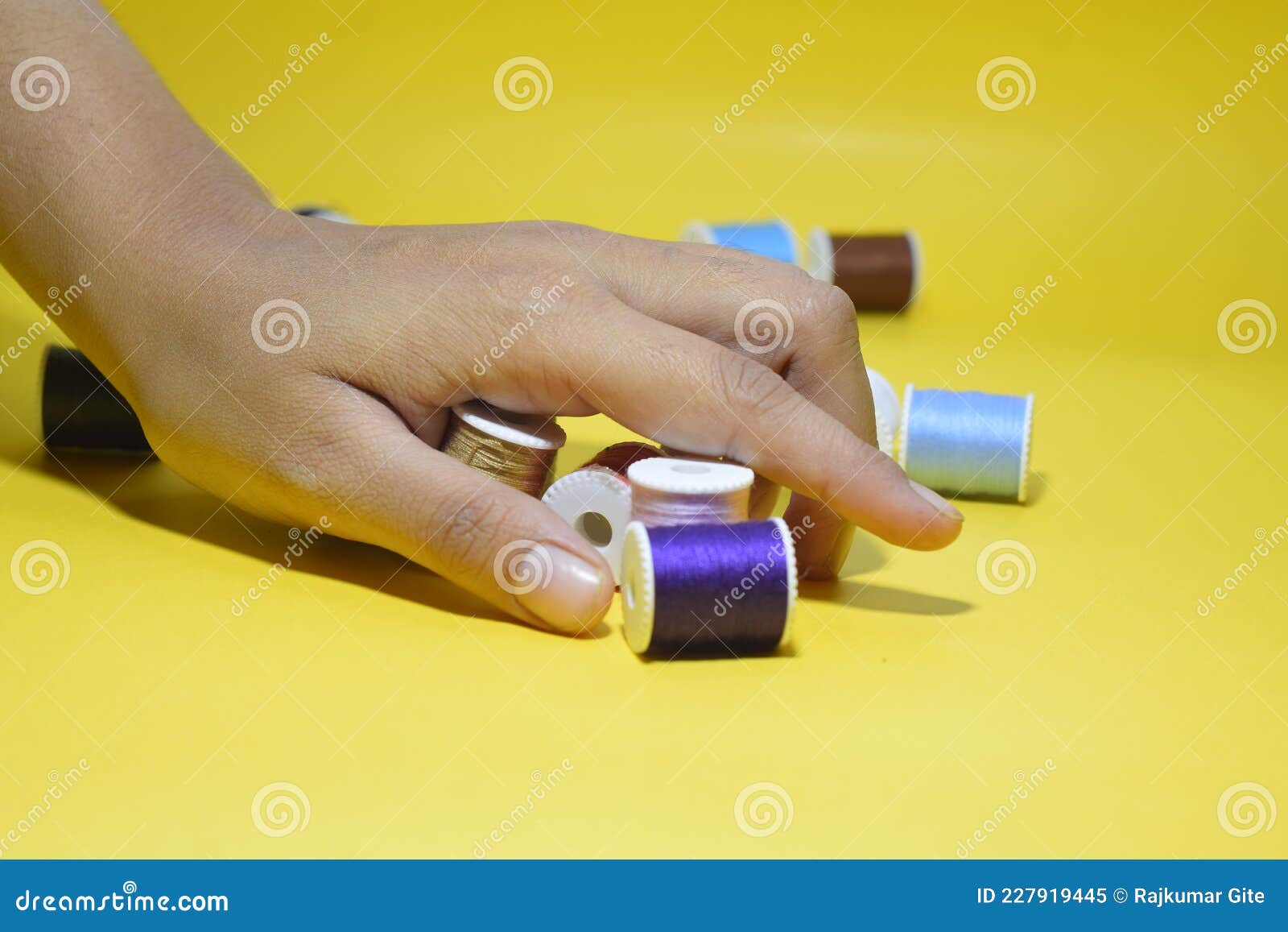 Hand Picking Up Colourful Threads for Sewing Machine Stock Image ...