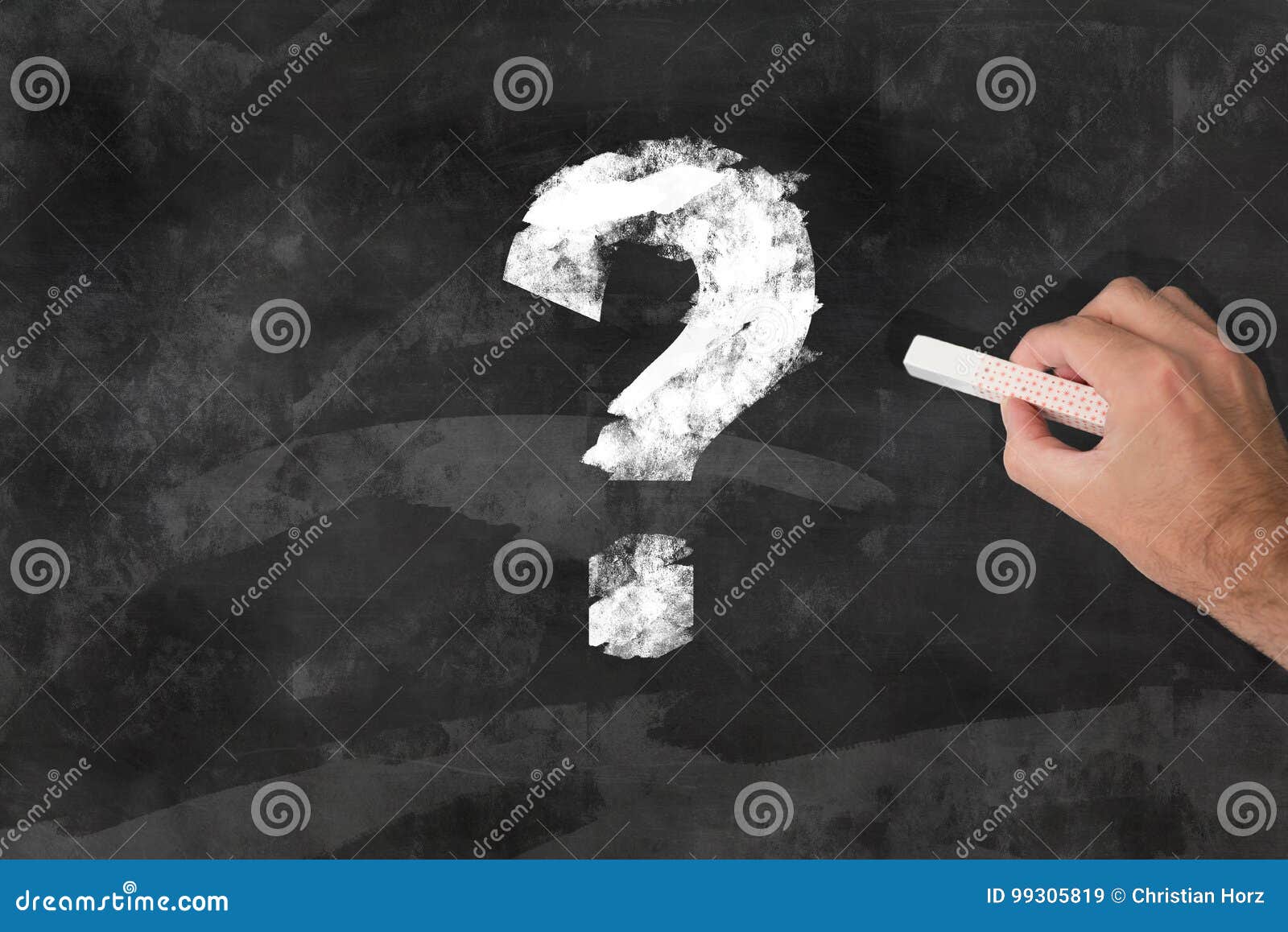 Hand with a Piece of Chalk Drawing a Question Mark on Blackboard Stock ...