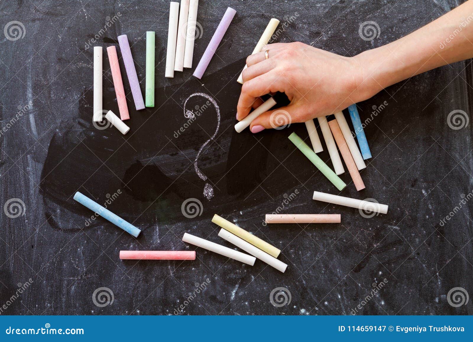 Hand with a Piece of Chalk Drawing a Question Mark Stock Image - Image ...