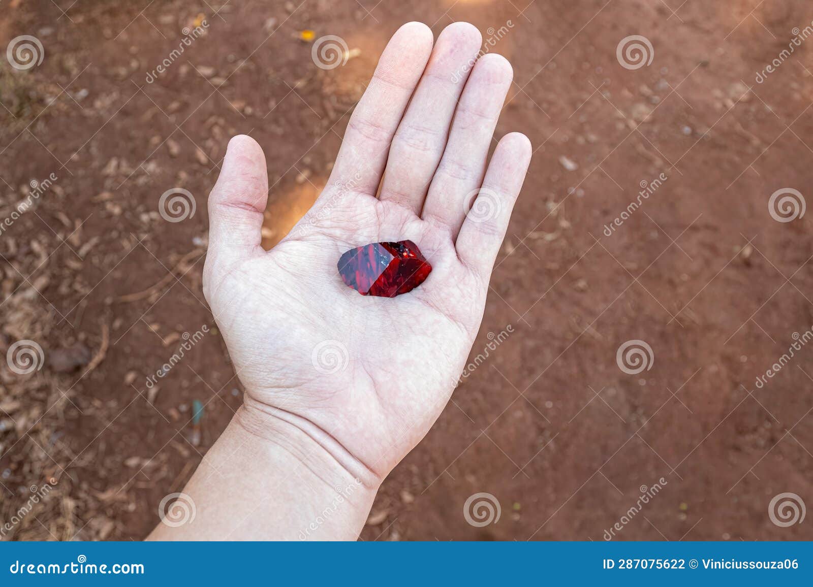 Hand with piece of ruby stock photo. Image of brilliant - 287075622
