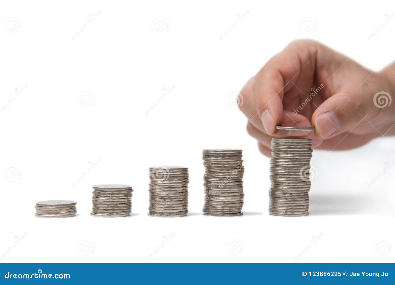 Hand Piling Up Coins with Copy Space. Stock Image - Image of money ...