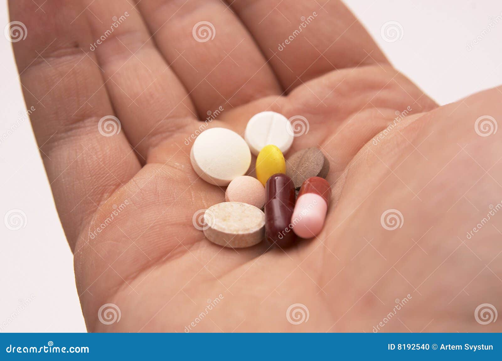 Hand with pills stock photo. Image of finger, fingers - 8192540