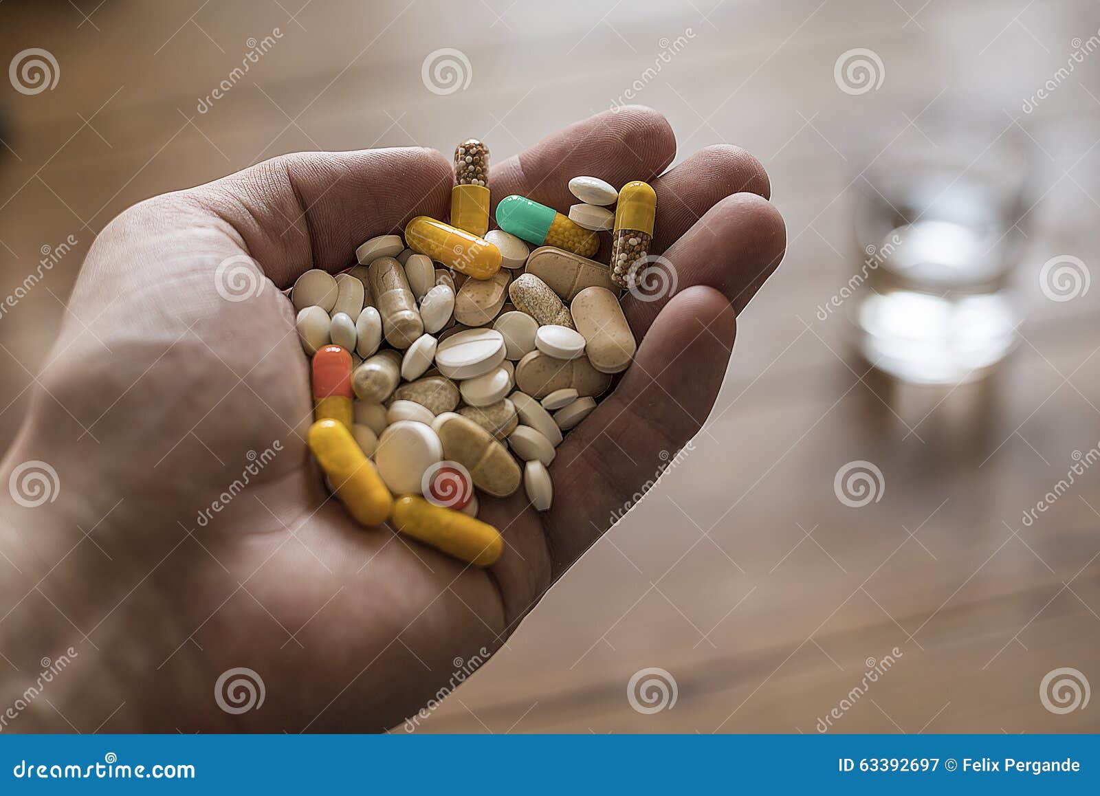 Hand with pills stock image. Image of help, medical, medicament - 63392697