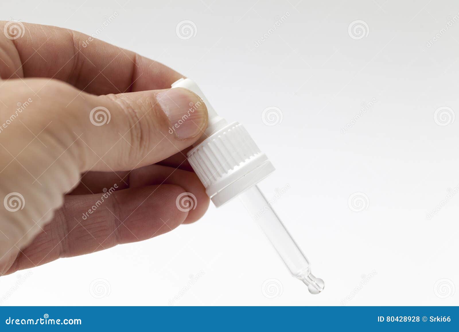 Hand with pipette stock photo. Image of essential, macro - 80428928