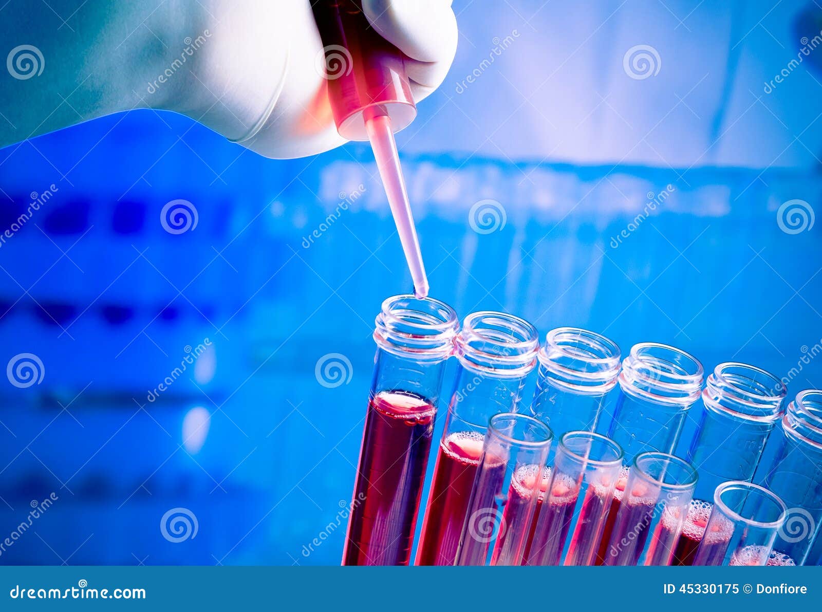 Hand With Pipette Dropping Sample Into Culture Medium Tube Royalty-Free ...