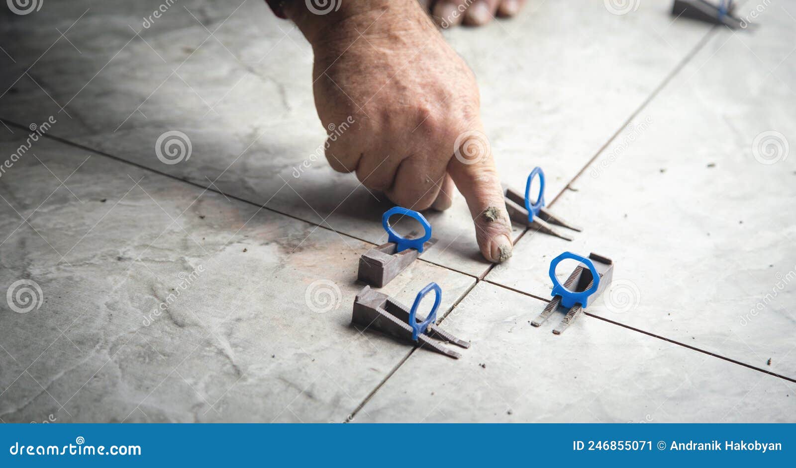 Hand Places a Plastic Clip between the Tile Stock Image - Image of ...