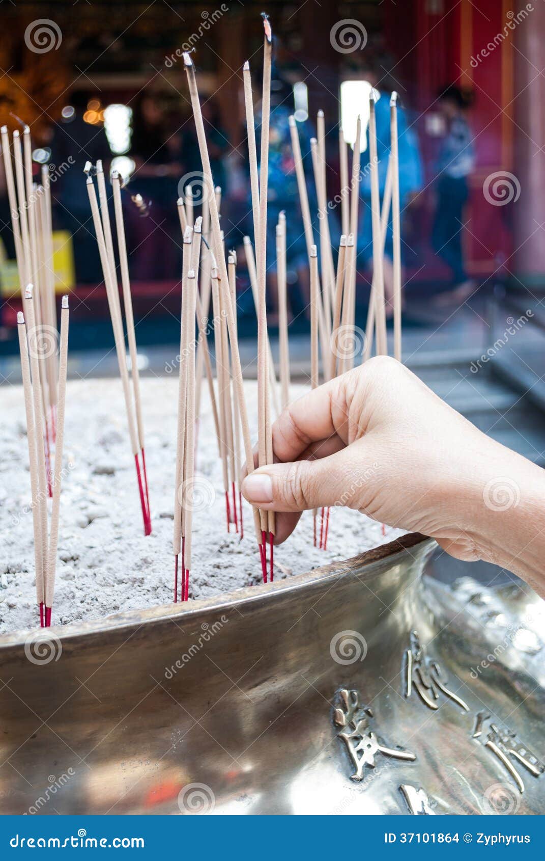 A Hand Places a Stick of Incense Stock Photo - Image of hindu, buddhist ...
