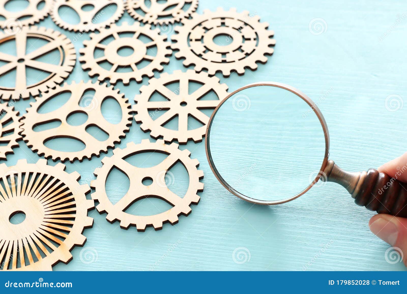Hand Placing a Cogwheel in Set of Gears Mechanism Stock Photo - Image ...